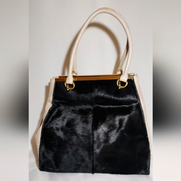 Wilsons Leather | Bags | Vintage Wilsons Leather Tan And Black Cowhide ...